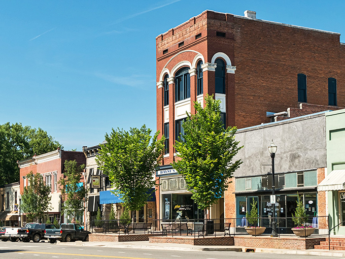 Downtown Milledgeville's vintage Coca-Cola sign isn't retro chic—it's the real deal, standing sentinel over Wayne Street like a carbonated time capsule.