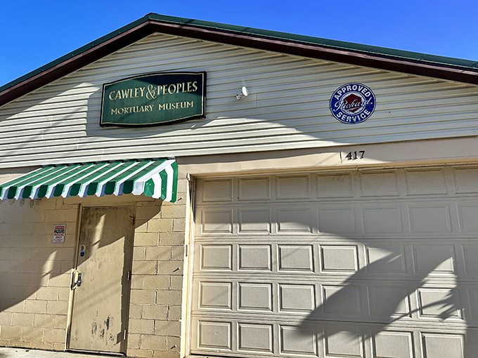 The unassuming exterior of Cawley & Peoples Mortuary Museum proves that you can't judge a book by its cover—or a museum by its garage door.