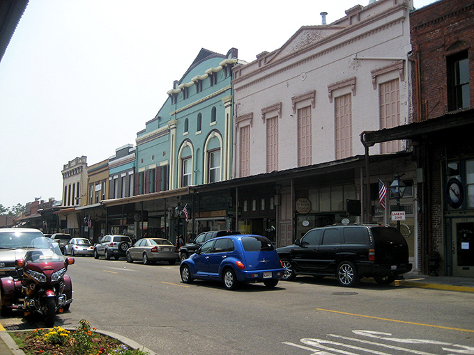Historic buildings line Grass Valley's Main Street, their colorful facades creating a living museum where Gold Rush history and modern life dance together.