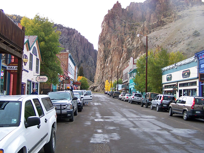 Downtown Creede stretches before you like a living postcard, where towering cliff walls play guardian to a main street that hasn't forgotten what year it was built.