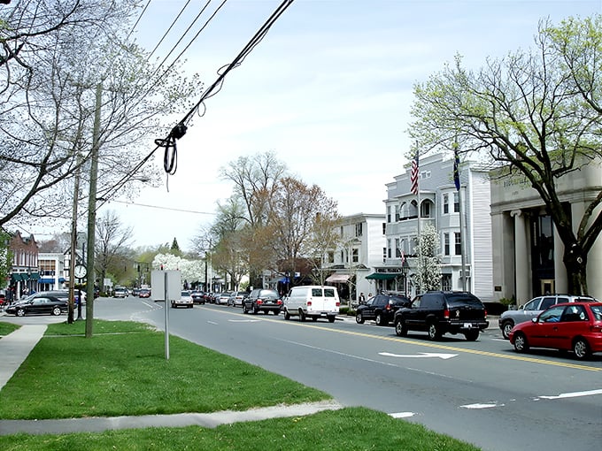 Main Street Ridgefield looks like a movie set where everyone got the memo about perfect New England charm. Those Tudor-style buildings aren't messing around.