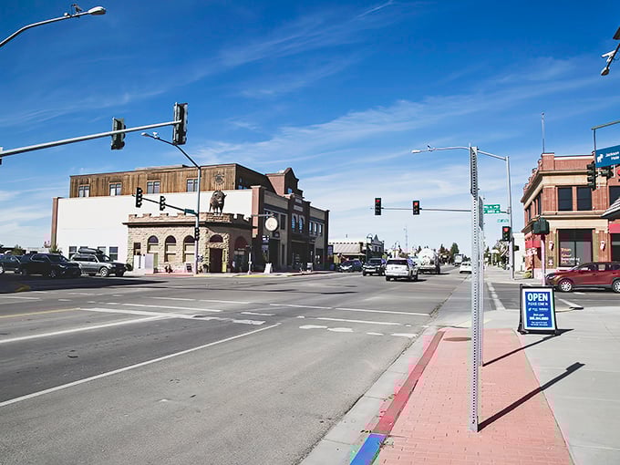Main Street Driggs – where Norman Rockwell meets mountain majesty. Those green lampposts and American flags aren't just decoration; they're a promise of small-town authenticity.