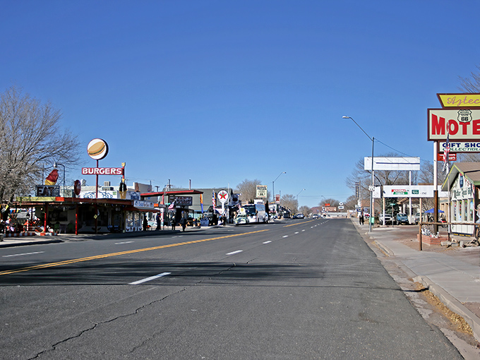 Main Street Seligman stretches before you like a living museum, where classic Americana meets desert sky in a perfect postcard of nostalgia.
