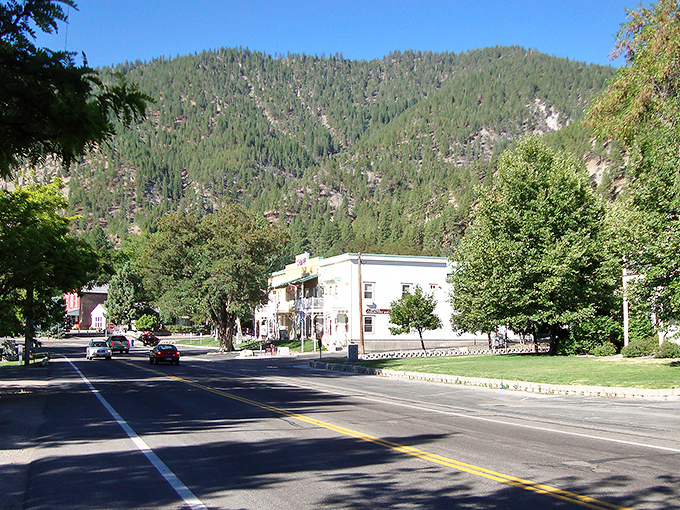 Genoa's main street offers a perfect postcard moment with the Sierra Nevada mountains creating a dramatic backdrop that changes with every season.
