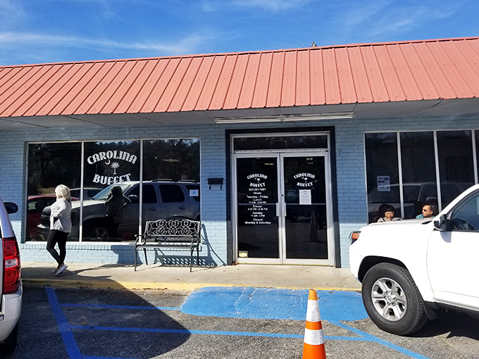 The unassuming blue exterior with its distinctive orange-red roof is the culinary equivalent of finding money in your old jacket pocket – an unexpected delight awaits.