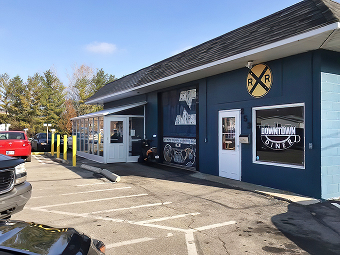 The unassuming blue exterior of Downtown Diner might not stop traffic, but the railroad crossing sign is actually warning: "Slow down or miss out on greatness."