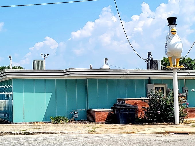 The unassuming turquoise exterior of Fast Eddie's might not scream "culinary destination," but locals know this modest building houses fried chicken greatness.