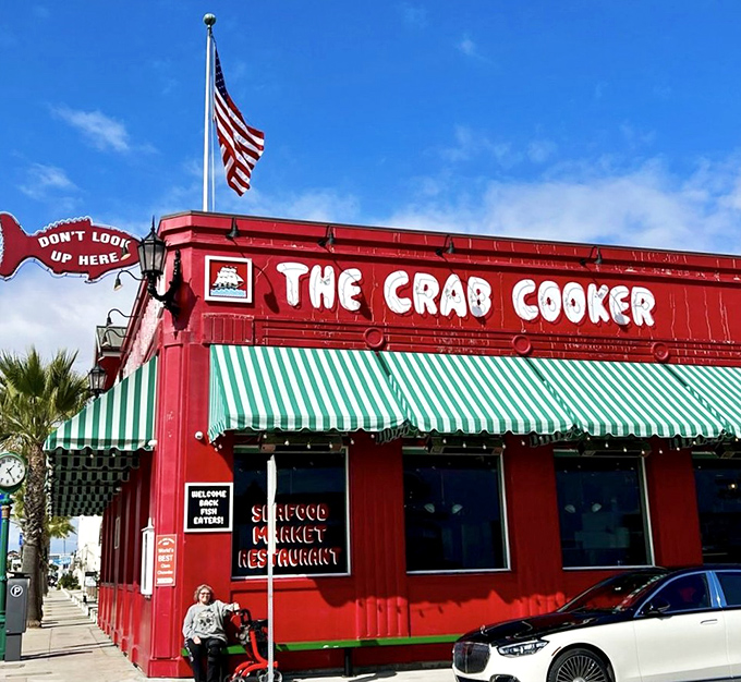 That fire-engine red exterior isn't just paint – it's a beacon calling seafood lovers from miles away.