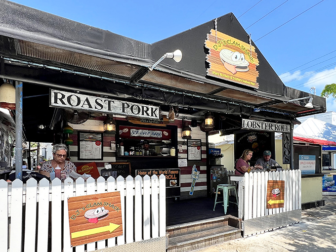 The white picket fence isn't keeping a secret—this tiny seafood haven on Duval Street has been discovered, and for good reason.