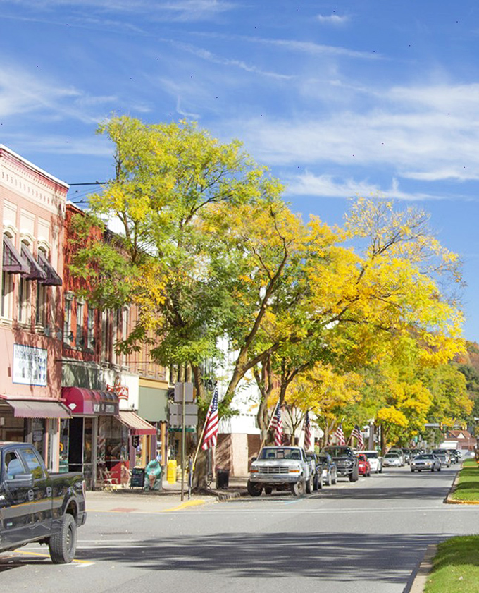 Wellsboro's Main Street isn't just a thoroughfare—it's a time machine with gas lamps that would make Narnia's Mr. Tumnus feel right at home.