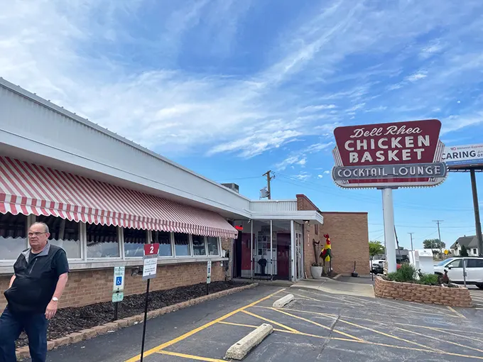 The iconic neon sign beckons hungry travelers like a lighthouse for comfort food enthusiasts. Route 66 history never tasted so good!