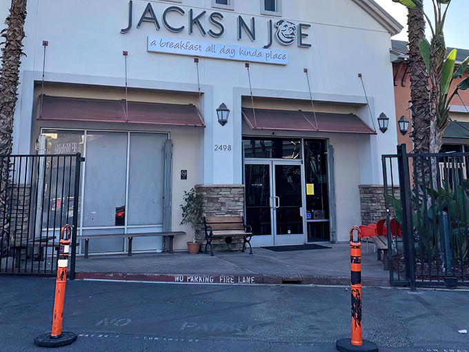 The unassuming storefront of Jacks N Joe promises "a breakfast all day kinda place" – a modest declaration for what awaits inside.