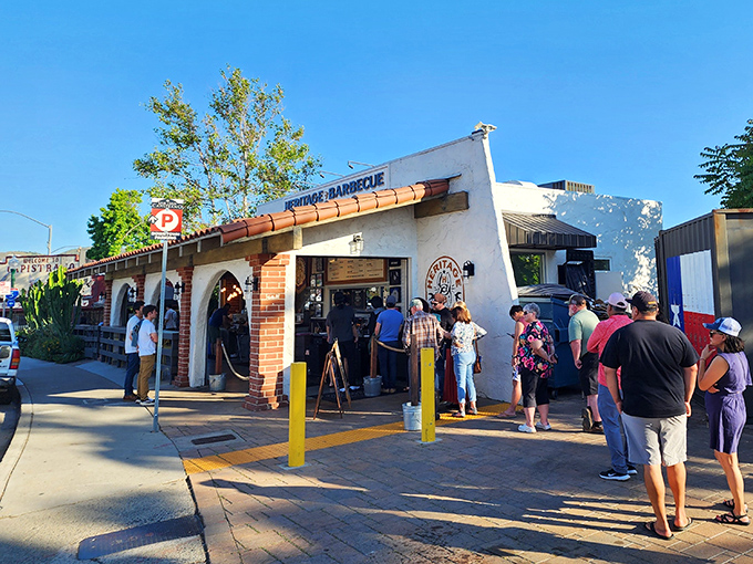 The line forms early at this unassuming white building in San Juan Capistrano, where smoke signals and heavenly aromas telegraph what's waiting inside.