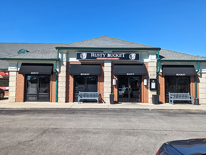 The unassuming exterior of Rusty Bucket belies the culinary treasures within. Like finding a vintage Rolex at a yard sale, this strip mall gem delivers unexpected delights.