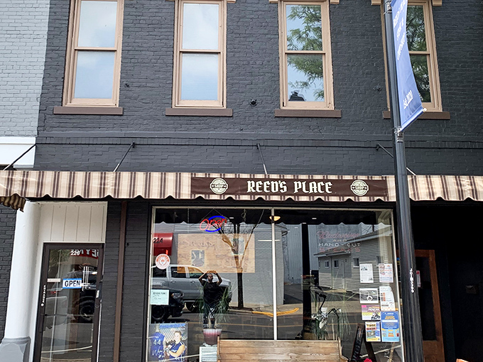 The modest black brick exterior of Reed's Place hides a carnivorous paradise within. Like finding a diamond in a hardware store.