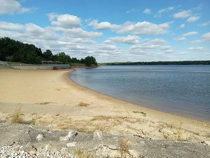 Golden sands curve along crystal-clear waters under a Midwest sky that seems to go on forever. Missouri's best-kept beach secret awaits.