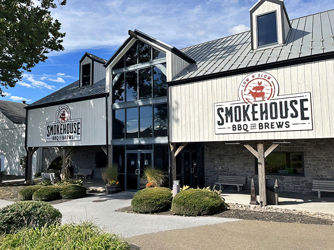 The barn-inspired architecture isn't just for show—it's a temple of smoke where barbecue dreams come true in Amish Country.