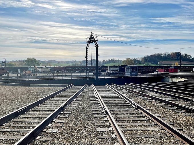 Railroad tracks at the Age of Steam Roundhouse Museum—where America's industrial heritage is preserved better than most of us preserve our New Year's resolutions.