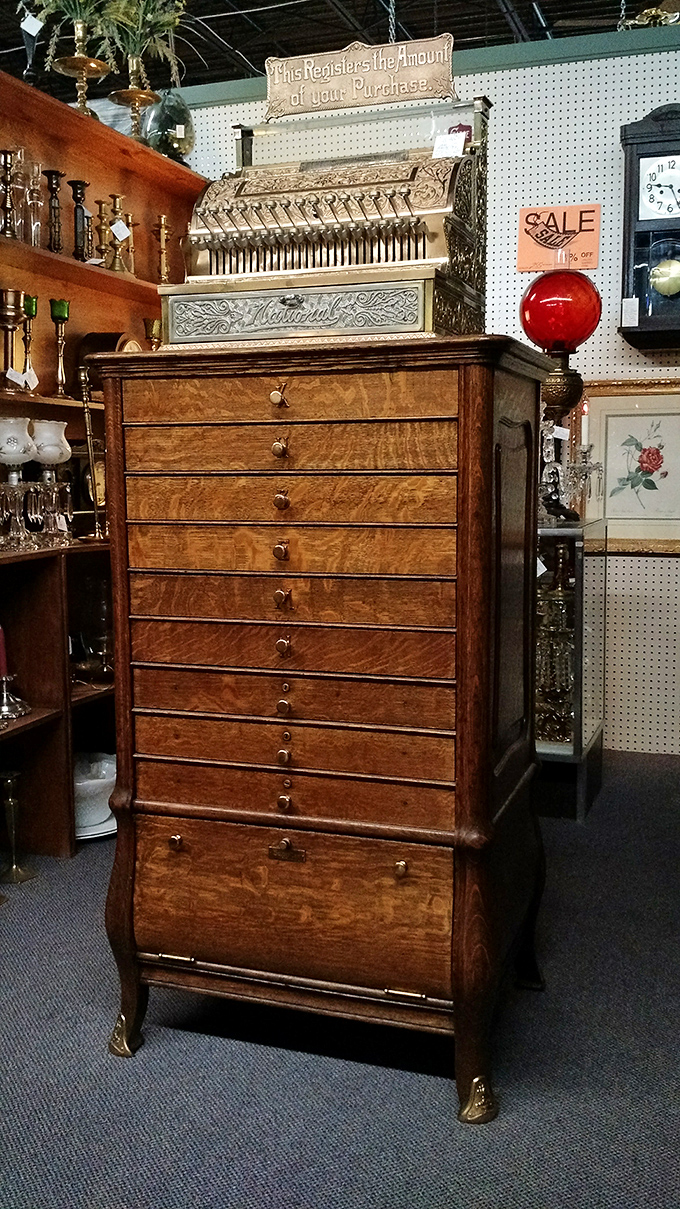 "This Register's the Amount of your Purchase"—and this magnificent National cash register is the amount of craftsmanship we've lost to technology.