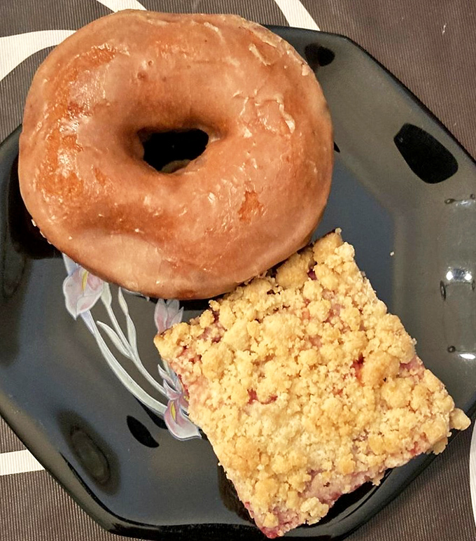 The perfect breakfast duo—a glazed donut and fruit square that technically counts as a serving of produce.
