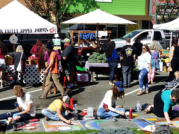 Saturday's farmers market transforms the plaza into a celebration of local bounty. Even the sidewalk chalk artists get into the community spirit.