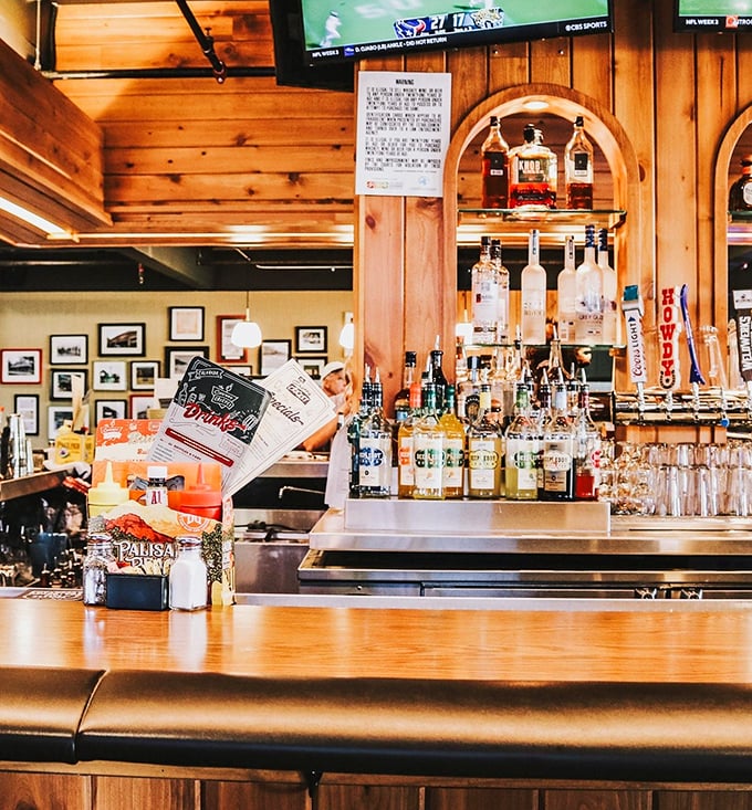A bar where everybody might not know your name yet, but they'll remember your burger order. Wood paneling and spirits—both kinds—in abundance.