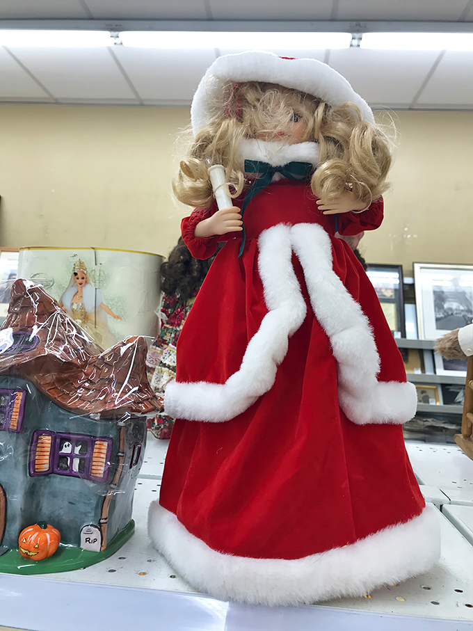 This Christmas doll isn't just festive—she's fabulous. Her velvet dress has more holiday spirit than the entire North Pole combined.