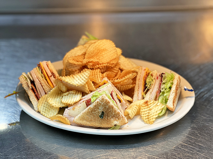 The club sandwich—that reliable friend who's always there when you need something substantial between two meetings or two naps.