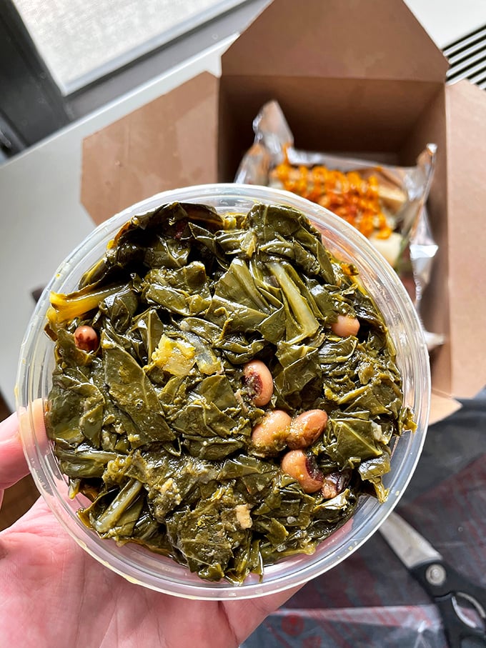 These collard greens, studded with black-eyed peas, aren't just a side dish—they're a Southern hug in a container.