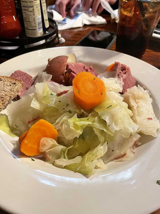 Corned beef and cabbage: where meat so tender it practically surrenders meets vegetables that have found their true calling.