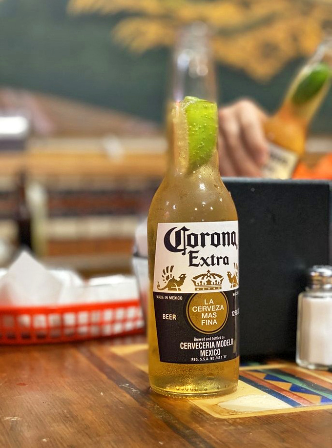 A Corona with lime—the classic companion to Mexican street food. Sometimes tradition endures for a reason, and that reason is delicious harmony.