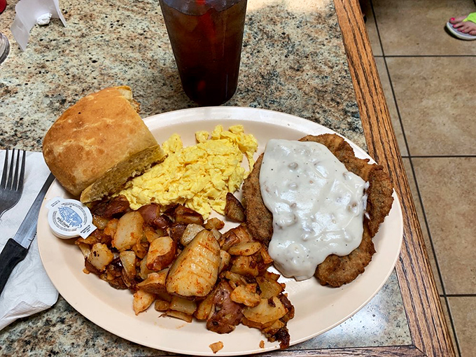 Country fried steak and eggs - the breakfast equivalent of a bear hug. Crispy coating, peppery gravy, and eggs that know exactly what they're doing.