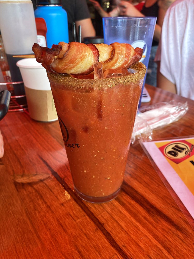 Their Bloody Mary doesn't just come with bacon—it's practically wearing it as a medal of honor. Sunday morning salvation in a glass.