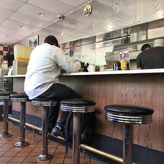 Behind this counter, breakfast alchemy happens daily, turning simple ingredients into gold that no chain restaurant can replicate.