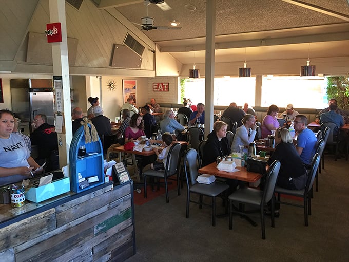 Where strangers become friends over shared breakfast enthusiasm—notice nobody's looking at their phones when food looks this good.