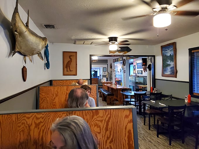 The wooden booths and mounted fish create that authentic "you're definitely in Florida" atmosphere that chain restaurants spend millions trying unsuccessfully to replicate.