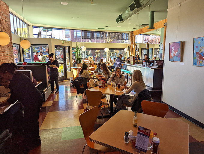 Where strangers become neighbors over plates of eggs and shared coffee refills – Seattle's community-building happens one breakfast at a time.