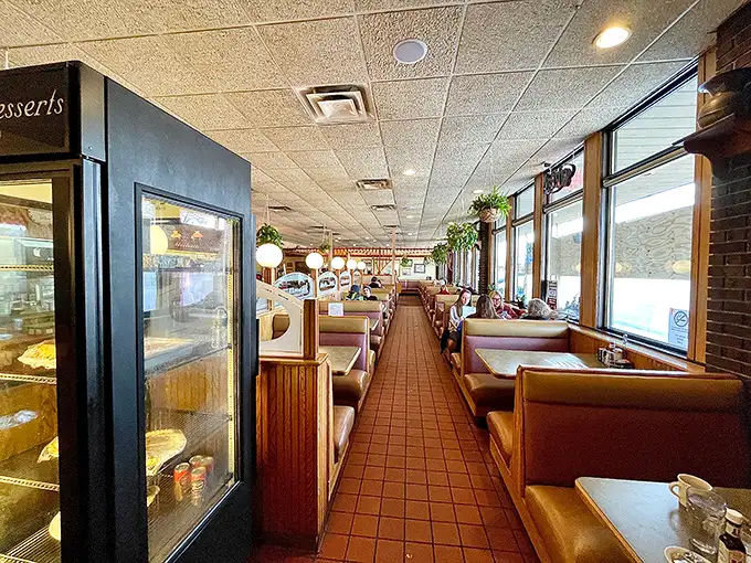 Booths lined up like passenger cars, ready to transport you to comfort food paradise. All aboard the Satisfaction Express, no ticket required.