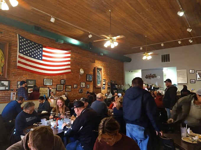 Weekend mornings bring a full house of locals who know the secret—this former firehouse now extinguishes hunger with remarkable efficiency.