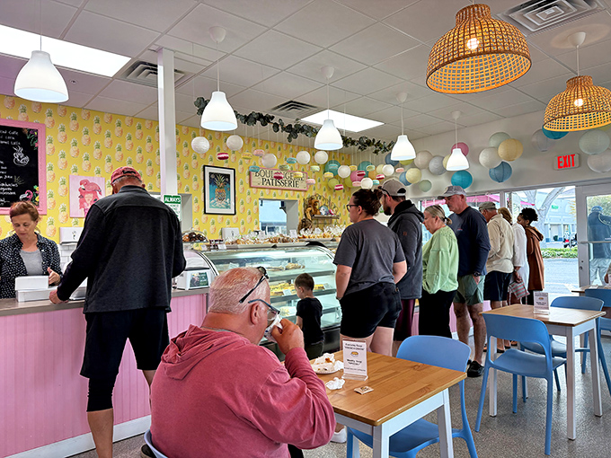 The line forms for good reason – these folks know that patience leads to pastry perfection. A pilgrimage to the altar of butter.