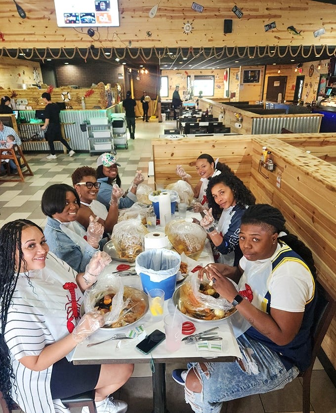 Plastic gloves, seafood bags, and smiling faces—the universal sign that serious eating is about to commence.