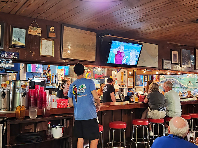 Where strangers become friends over shared love of seafood. The bar's string lights create that "you had to be there" atmosphere we all crave.