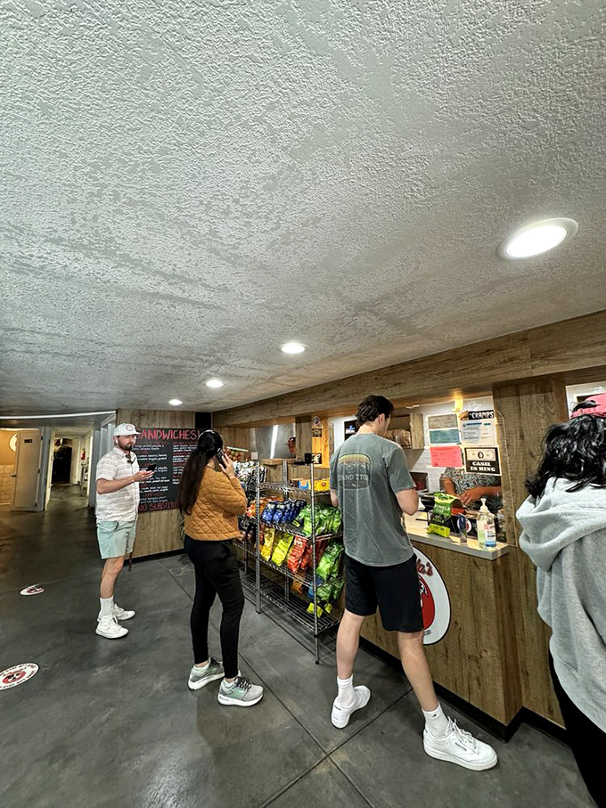 The lunch rush reveals the truth—locals know where to find sandwich nirvana. The ordering line moves with the efficiency of a well-rehearsed dance.