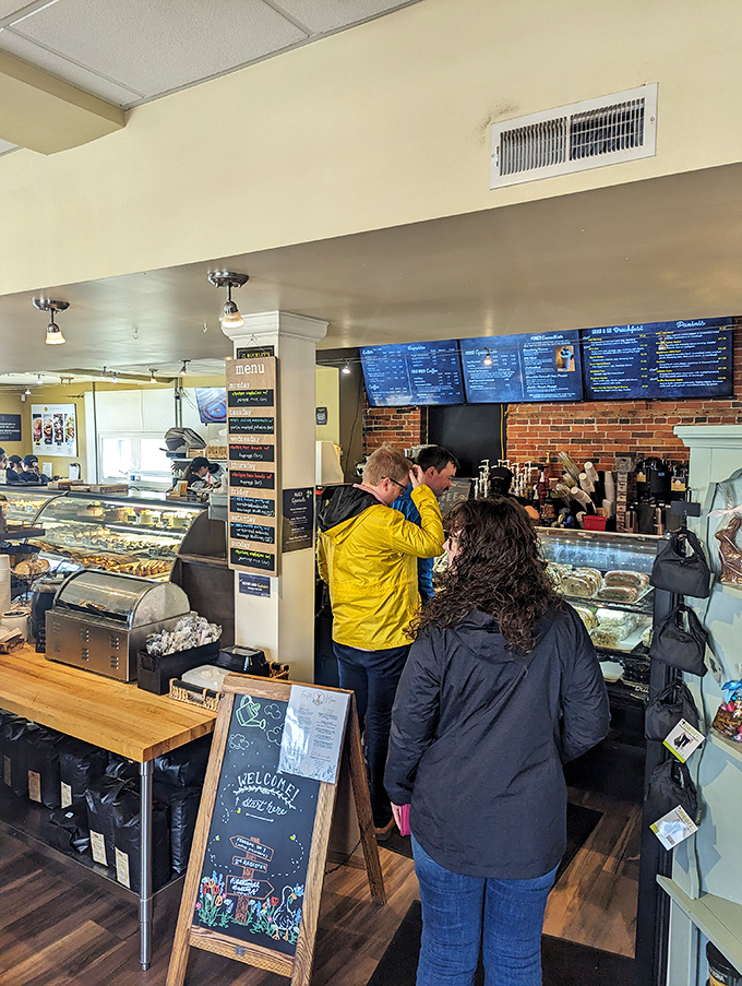 The ordering counter at Buckley's: where dreams and hunger pangs converge. That display case is the Las Vegas of baked goods—all temptation, no regrets.