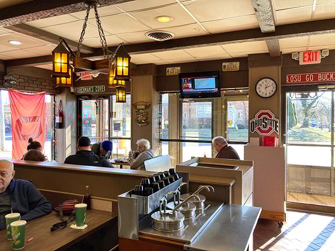 Local diners know the secret – Ohio State memorabilia watches over patrons as they indulge in coastal flavors in the heart of the Midwest.