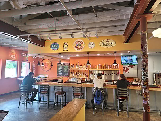The bar area where chicken enthusiasts gather to discuss important topics like "How are you still standing after ordering the XX Hot?"