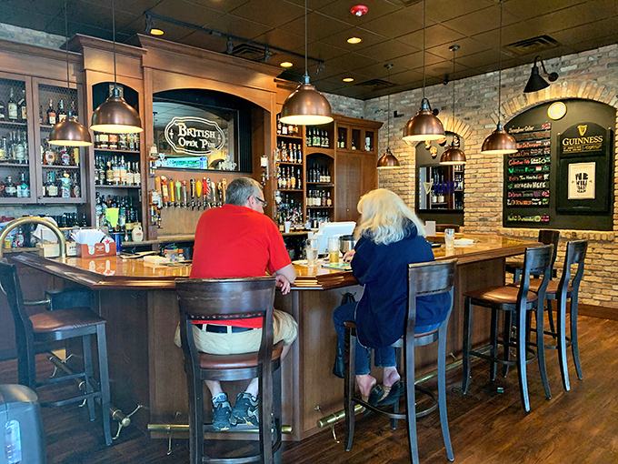 Where locals gather to escape Florida's heat. The curved wooden bar with its lineup of taps creates the heart of this community gathering spot.