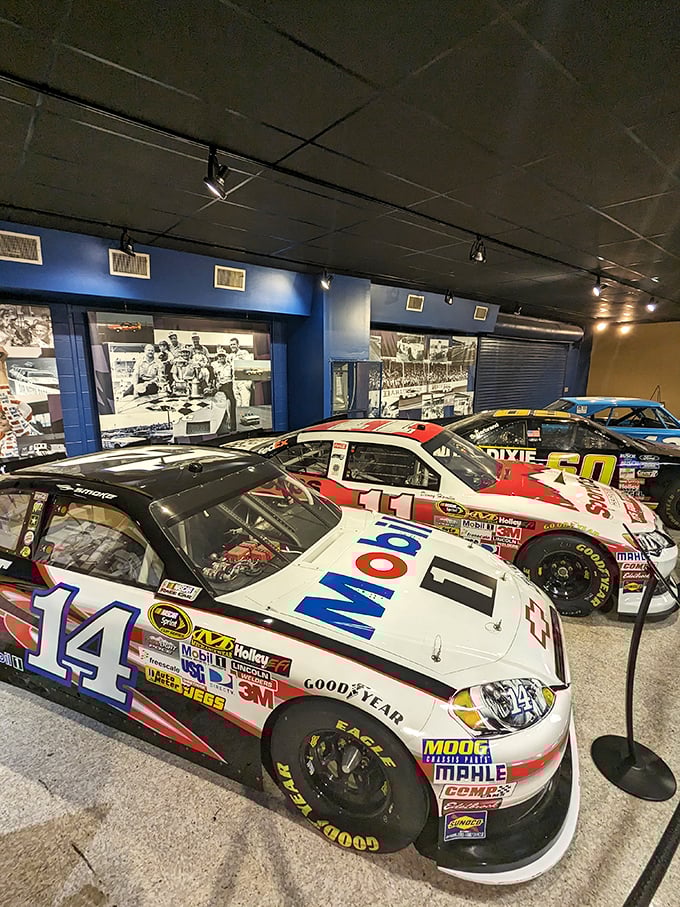 Modern NASCAR's evolution on display – from simple stock cars to the aerodynamic marvels of today.
