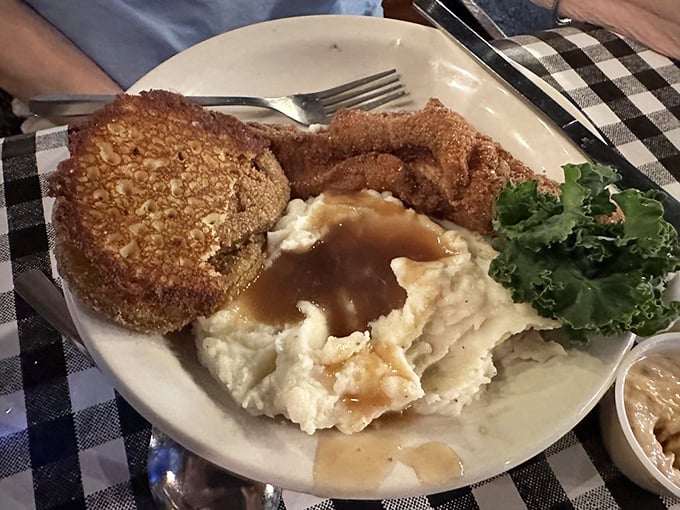 A plate that proves fish doesn't need an ocean nearby to taste this good. Those crispy edges tell stories of perfect temperature and timing.