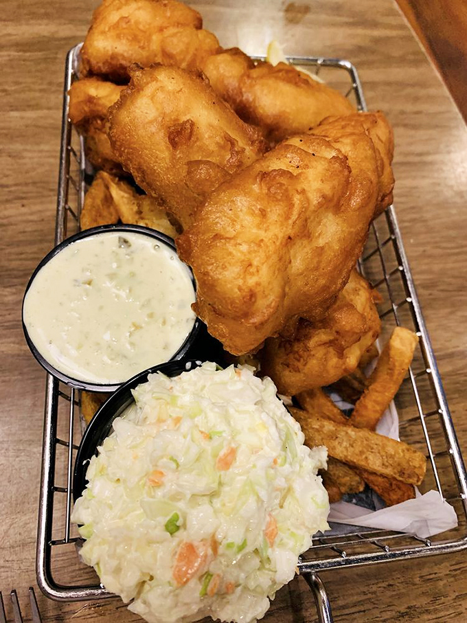 This isn't just fish and chips—it's a golden-battered masterpiece with coleslaw that would make a British pub-goer weep with joy.